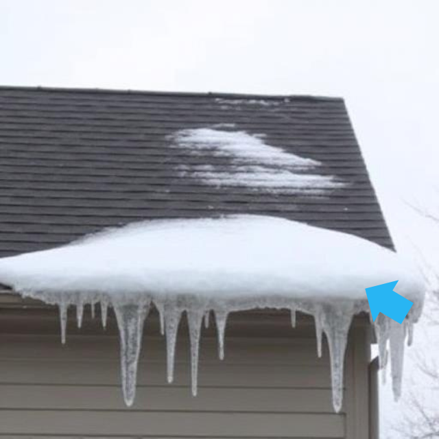 What Is A Roof Ice Dam? - Tridom Roofing Glossary